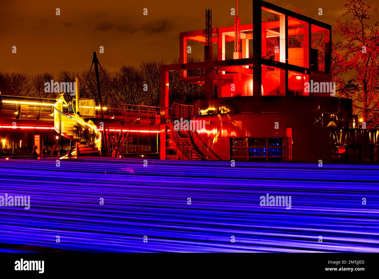 Paris, France. 25th Dec, 2022. Aftereal, moving threads and UV light ...