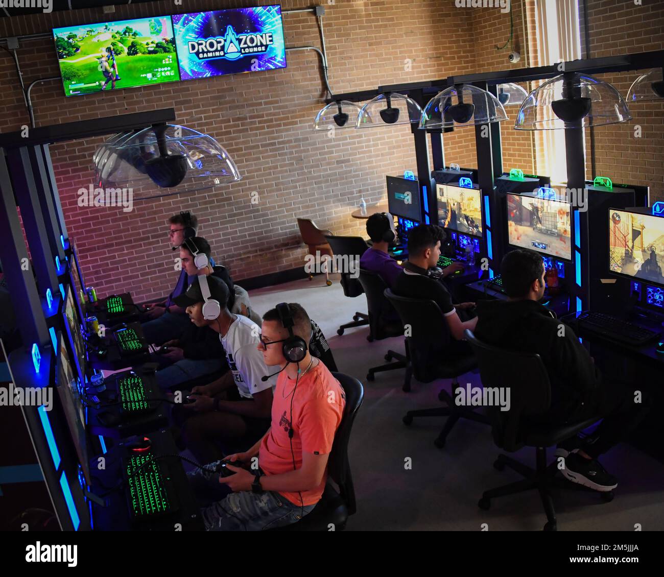 A team of U.S. Air Force Airmen in Training, left, battle it out ...