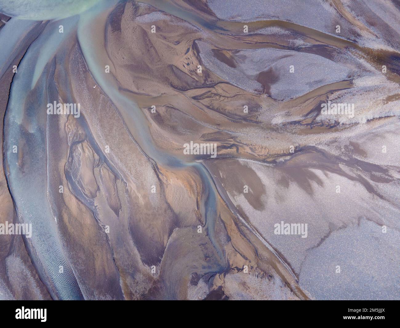 An aerial drone view of a huge riverbed and delta, glacial river system ...