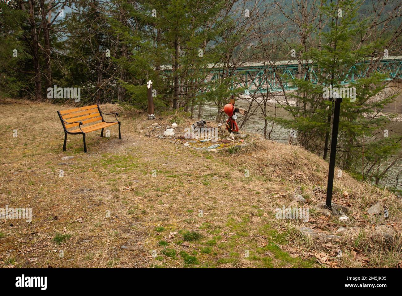 Bench and memorials overlooking the Fraser River in Boston Bar, British ...