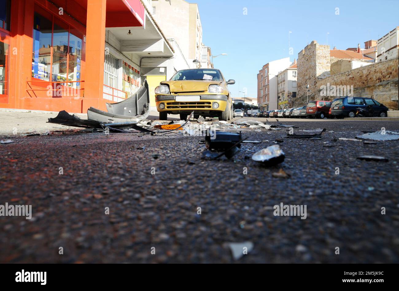 Car parked on the city road having a collision with another vehicle ...