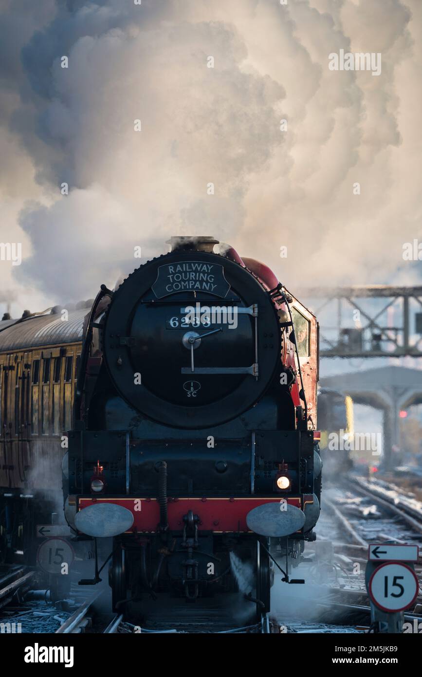 Steam train 46233 approaching Clapham Junction on a freezing cold ...