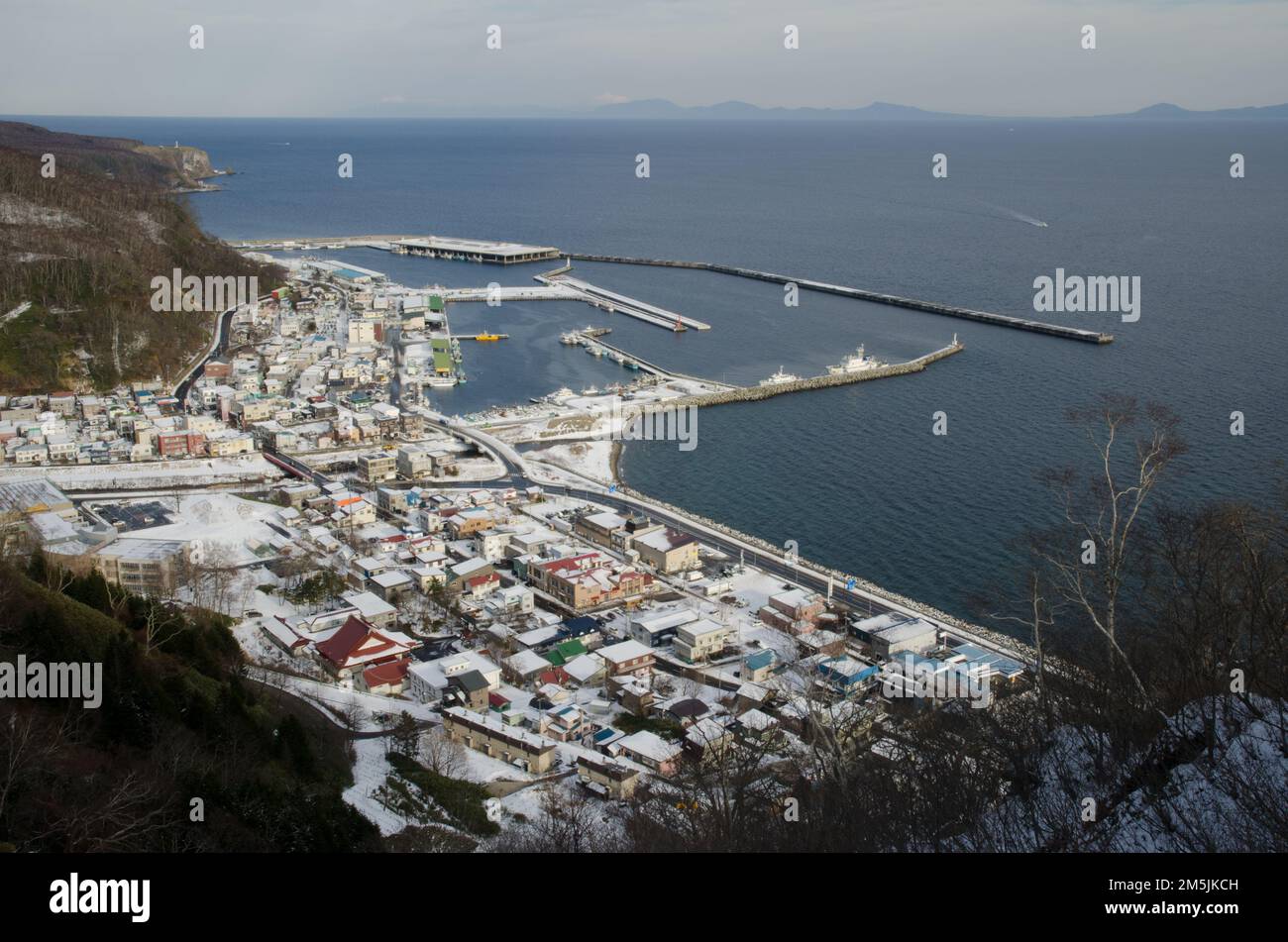 Town of Rausu and Kunashir Island in the background. Shiretoko ...