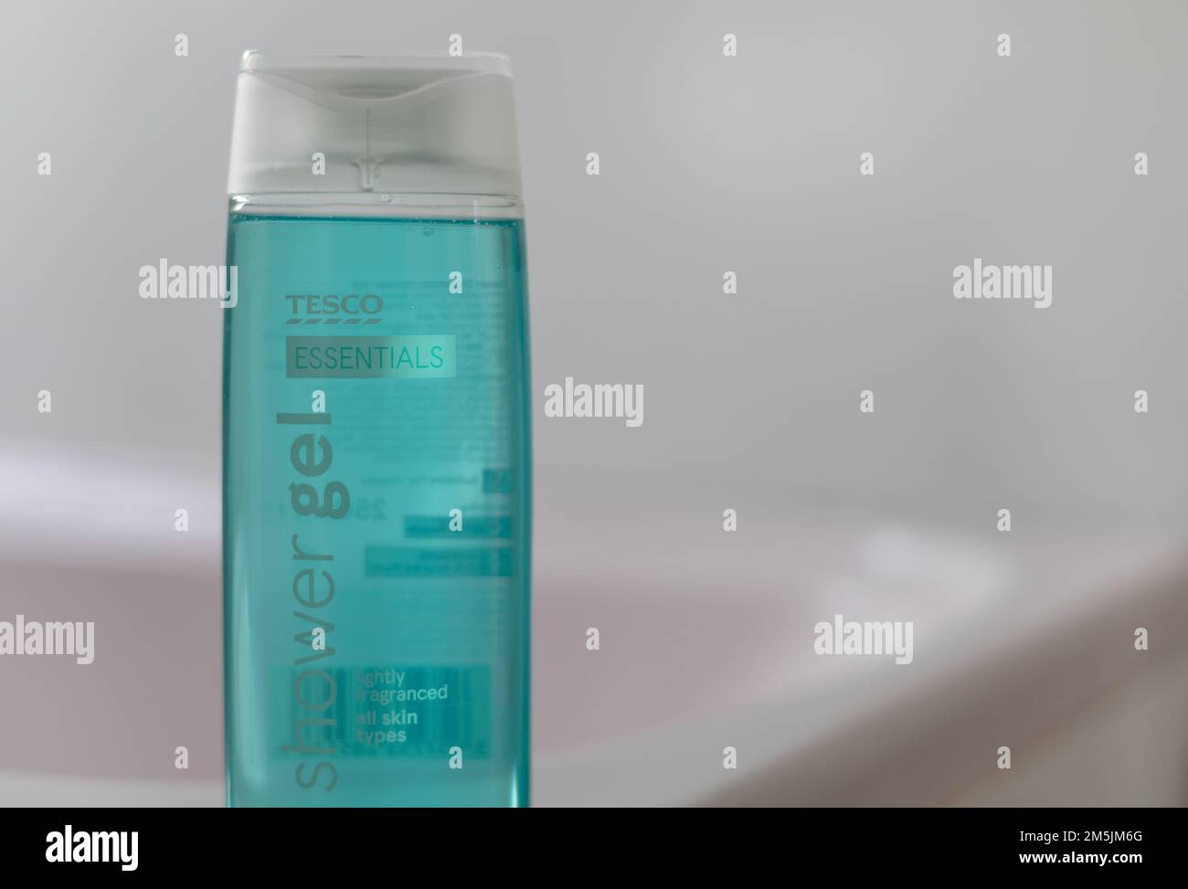 A bottle of Tesco’s budget range Essentials shower gel in a bathroom ...