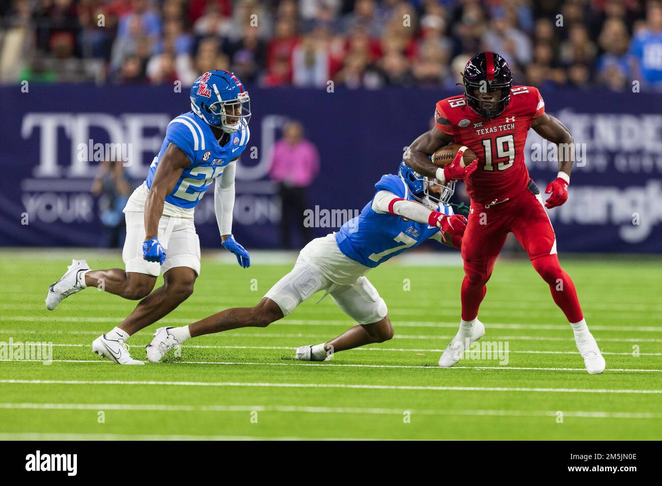 Texas Tech Red Raiders wide receiver Loic Fouonji (19) escapes the ...