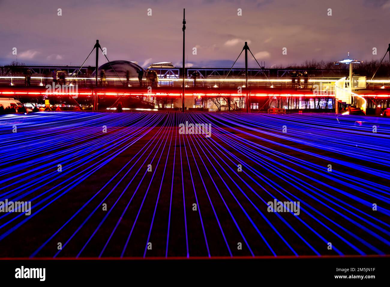 Paris, France. 27th Dec, 2022. Aftereal, moving threads and UV light ...