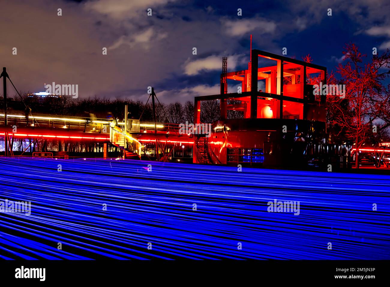 Paris, France. 27th Dec, 2022. Aftereal, moving threads and UV light ...