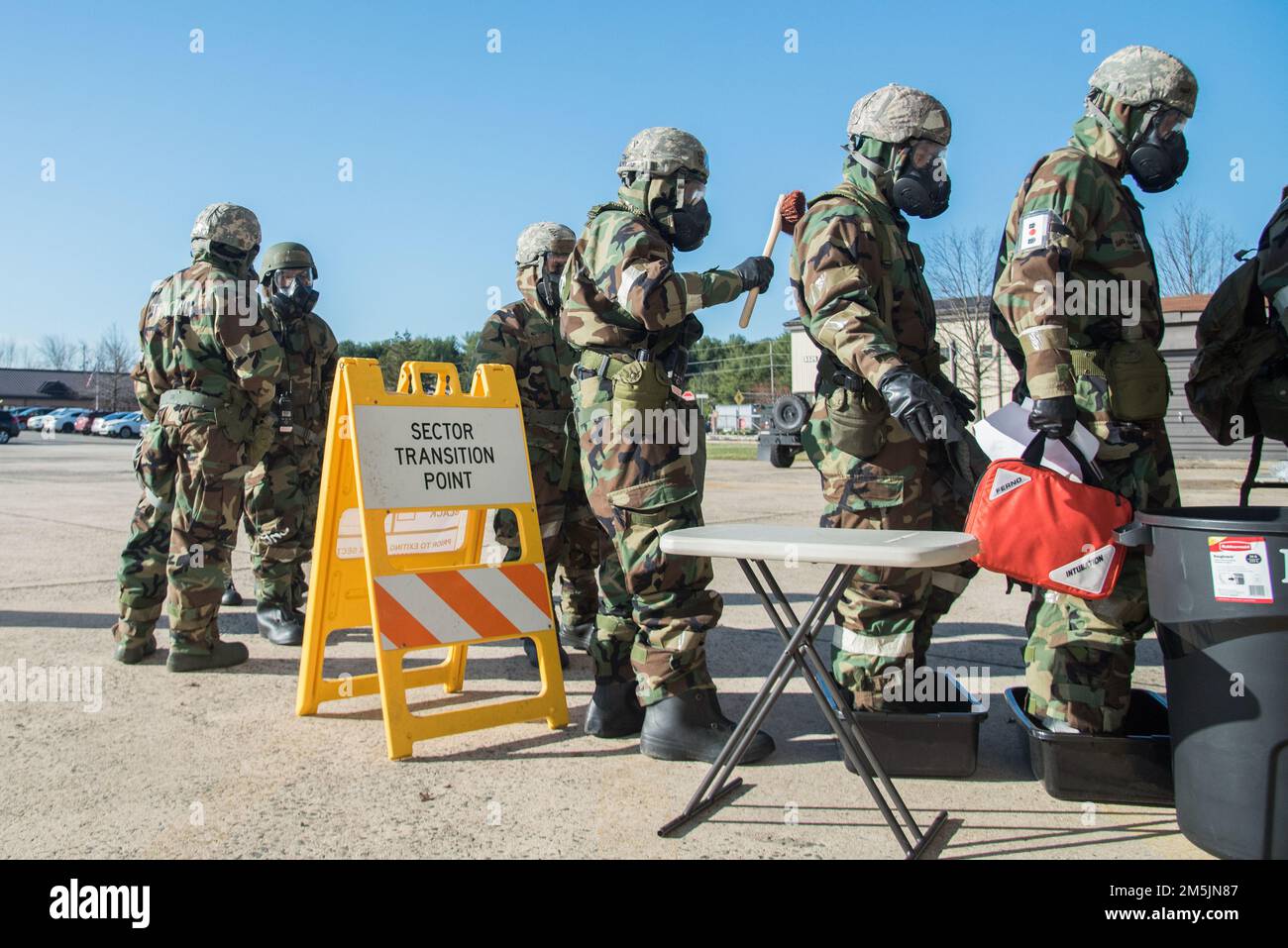 U.S. Air Force Airmen from the 108th Wing go through a decontamination ...
