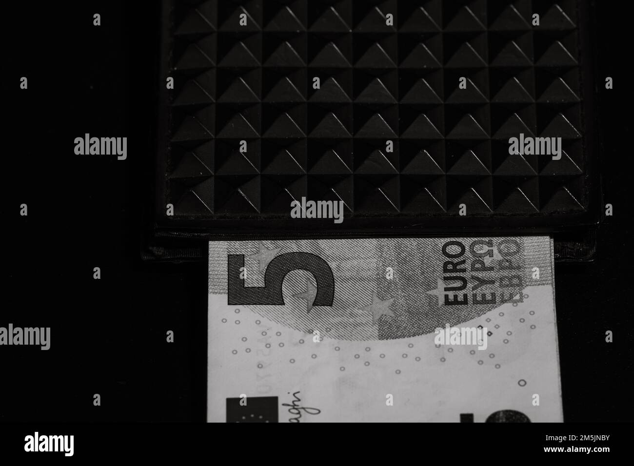 5 Euro money banknotes in black wallet isolated Stock Photo - Alamy