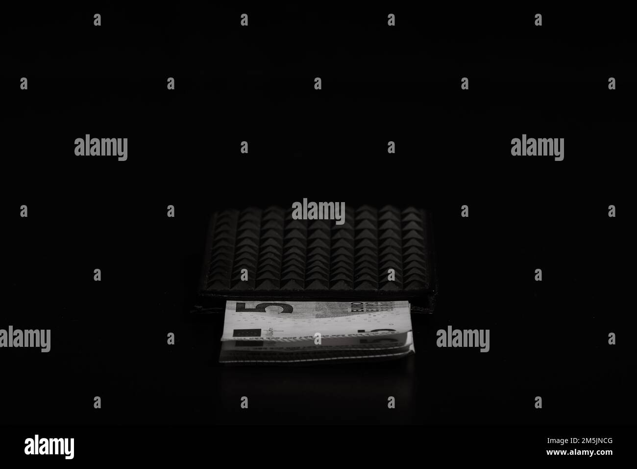 5 Euro money banknotes in black wallet isolated Stock Photo - Alamy