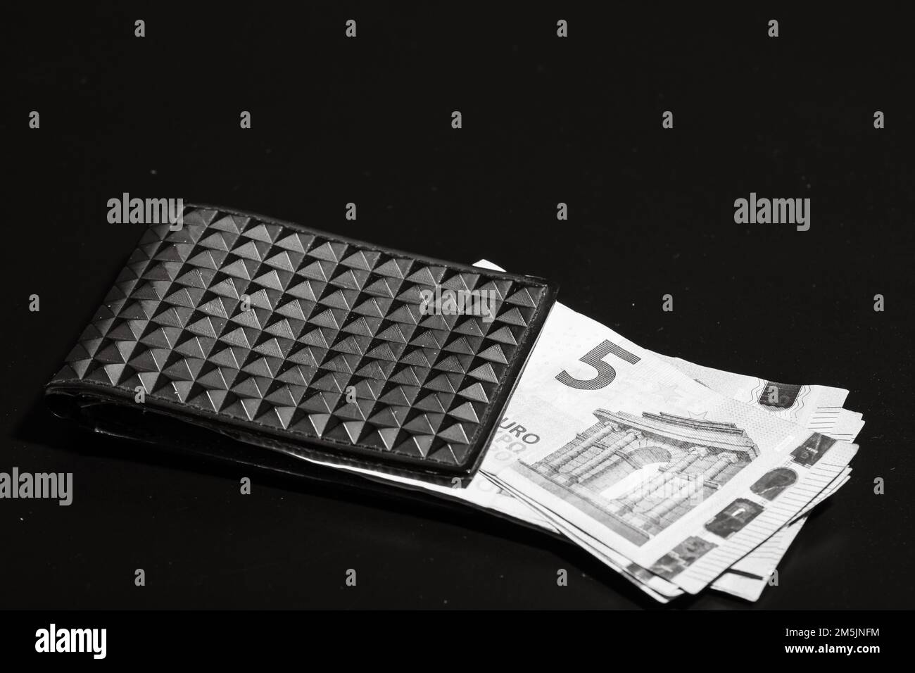 5 Euro money banknotes in black wallet isolated Stock Photo - Alamy