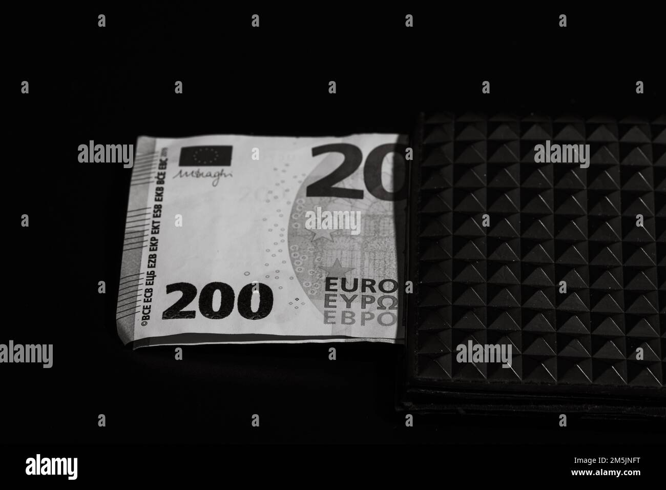200 Euro banknotes in a black wallet isolated Stock Photo - Alamy