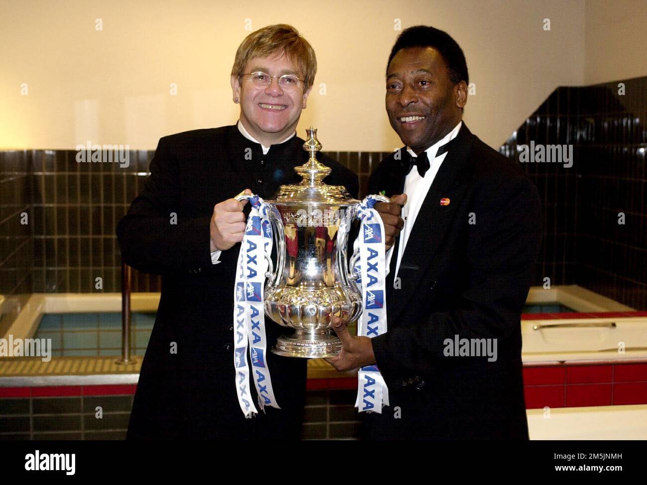 File photo dated 02-11-2000 of Singer Sir Elton John with football ...