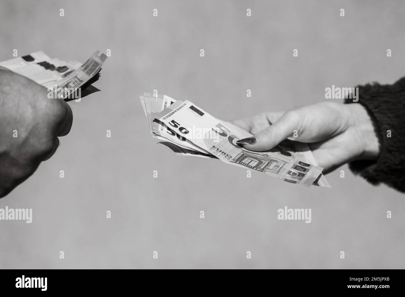 Hand giving money like bribe or tips or salary isolated, hard worked ...