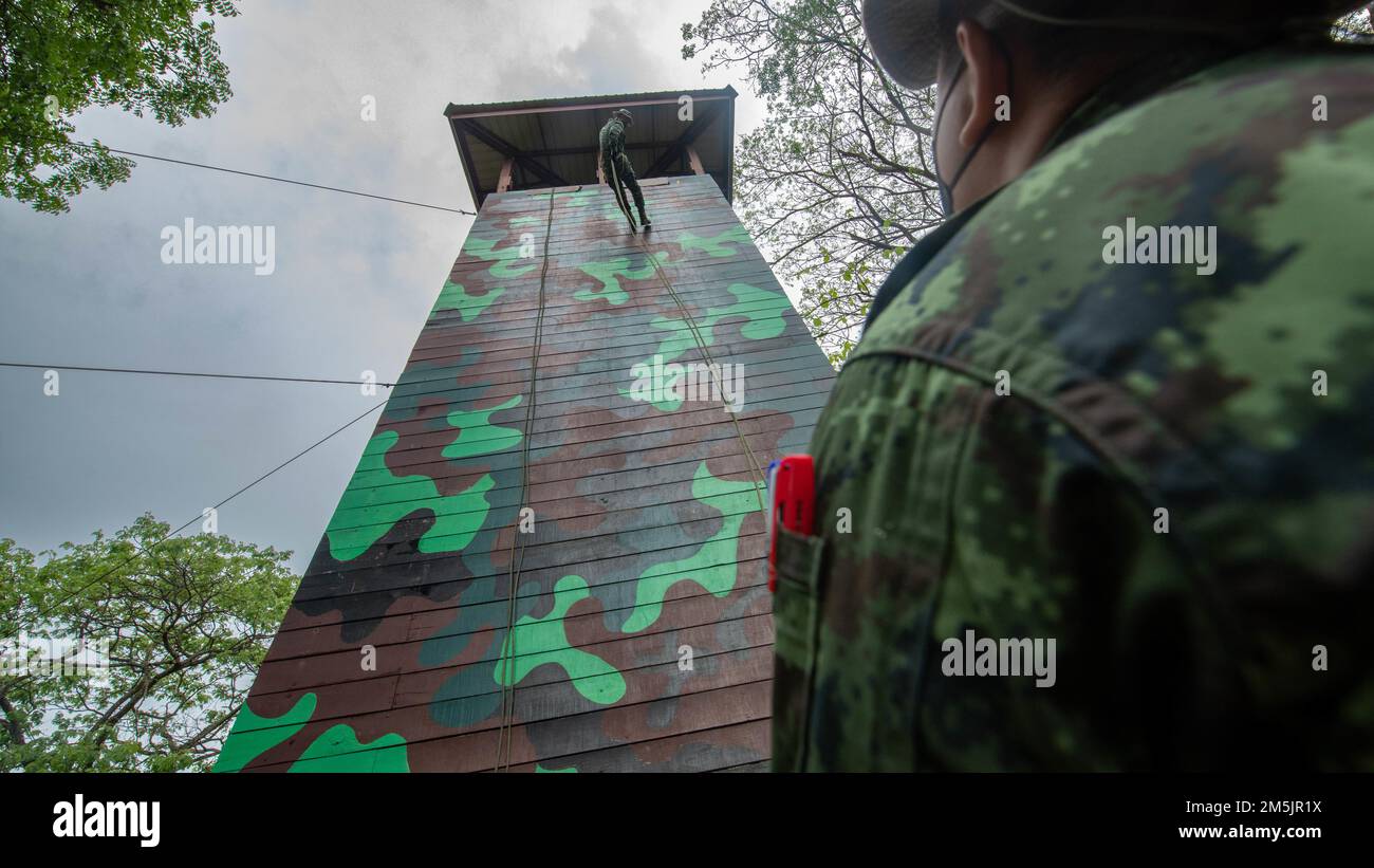 Instructors from the Royal Thai Army demonstrate repelling techniques ...