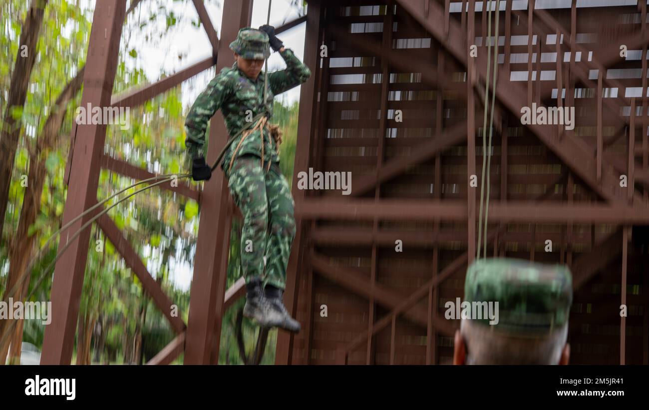 Instructors from the Royal Thai Army demonstrate repelling techniques ...