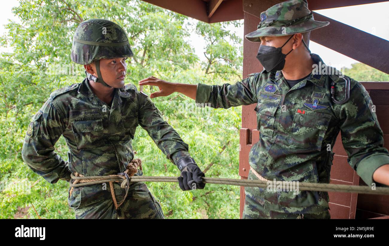 A Royal Thai Army soldier listens to instructions from a safety officer ...