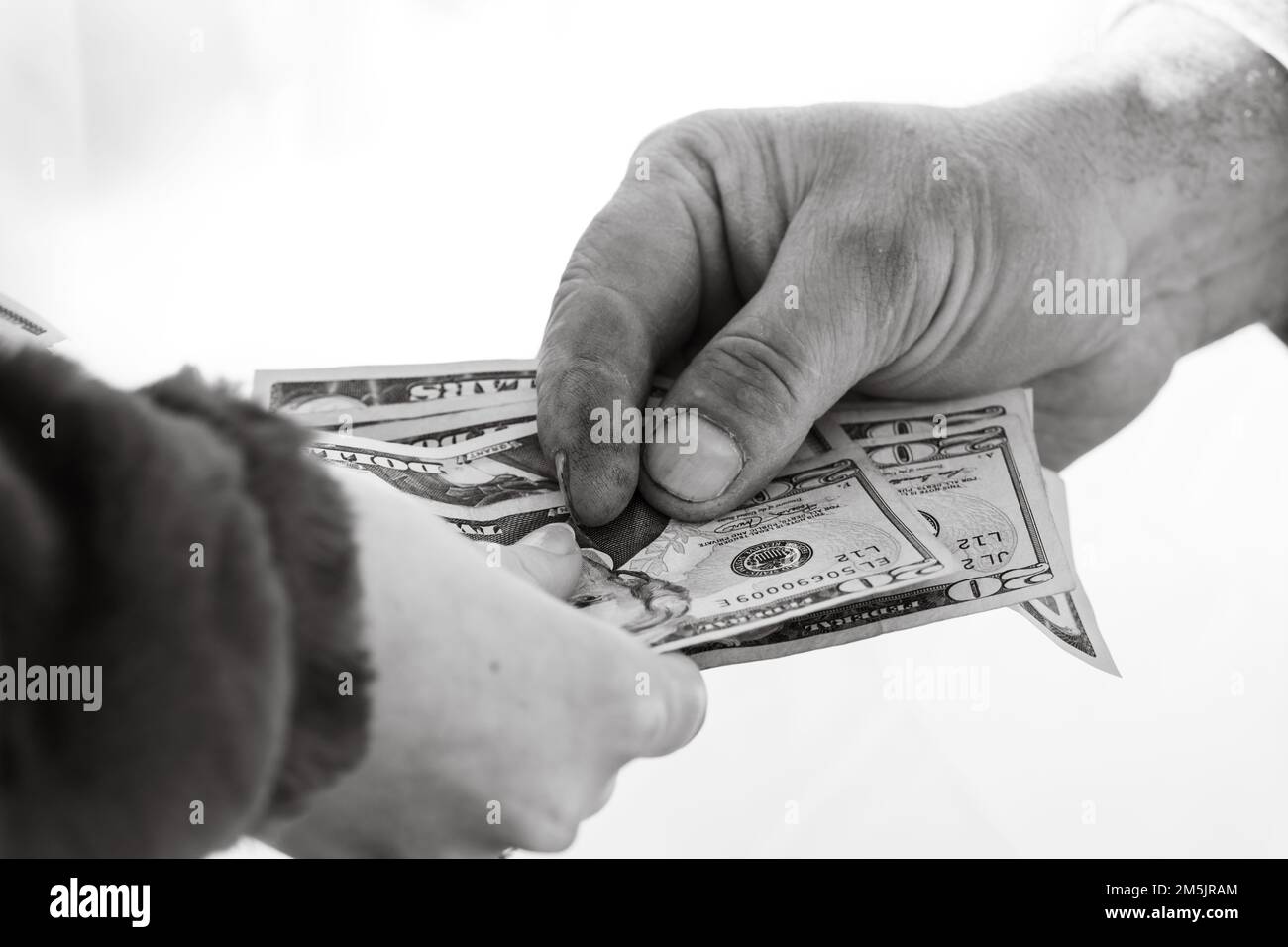 Hand giving money isolated, hard worked hand taking dollars money ...