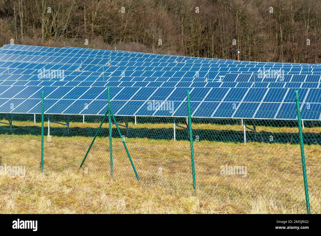 A solar photovoltaic power plant on the field. Solar panels on the ...