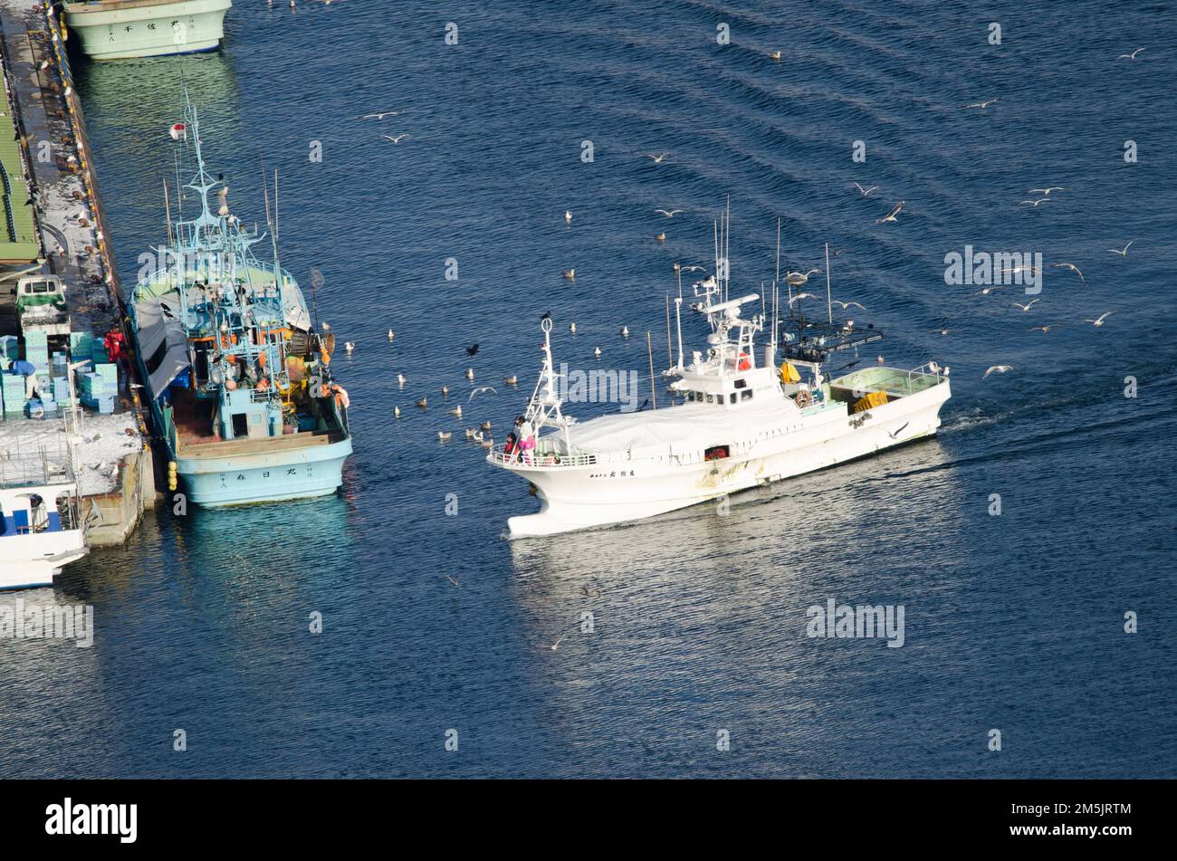 Rausu, November 28, 2017: View of a fishing boat arriving at port ...