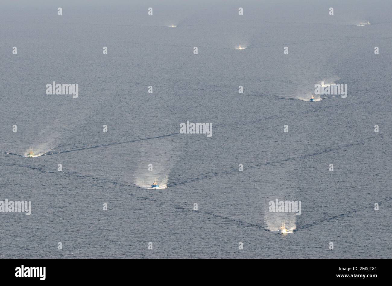 View of fishing boats returning to port. Rausu. Shiretoko Peninsula ...