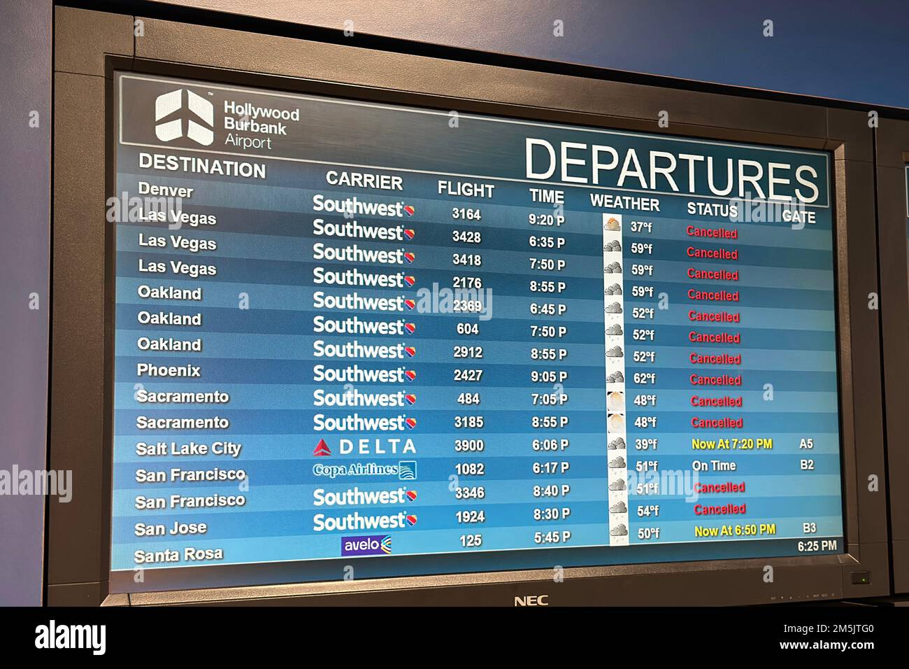 A departures flight information monitor with on-time, delayed and ...