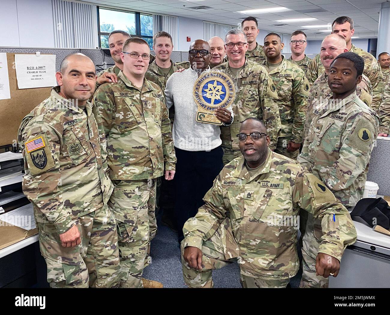 Soldiers from 4th Battalion, 399th Regiment, pose for a photo with ...