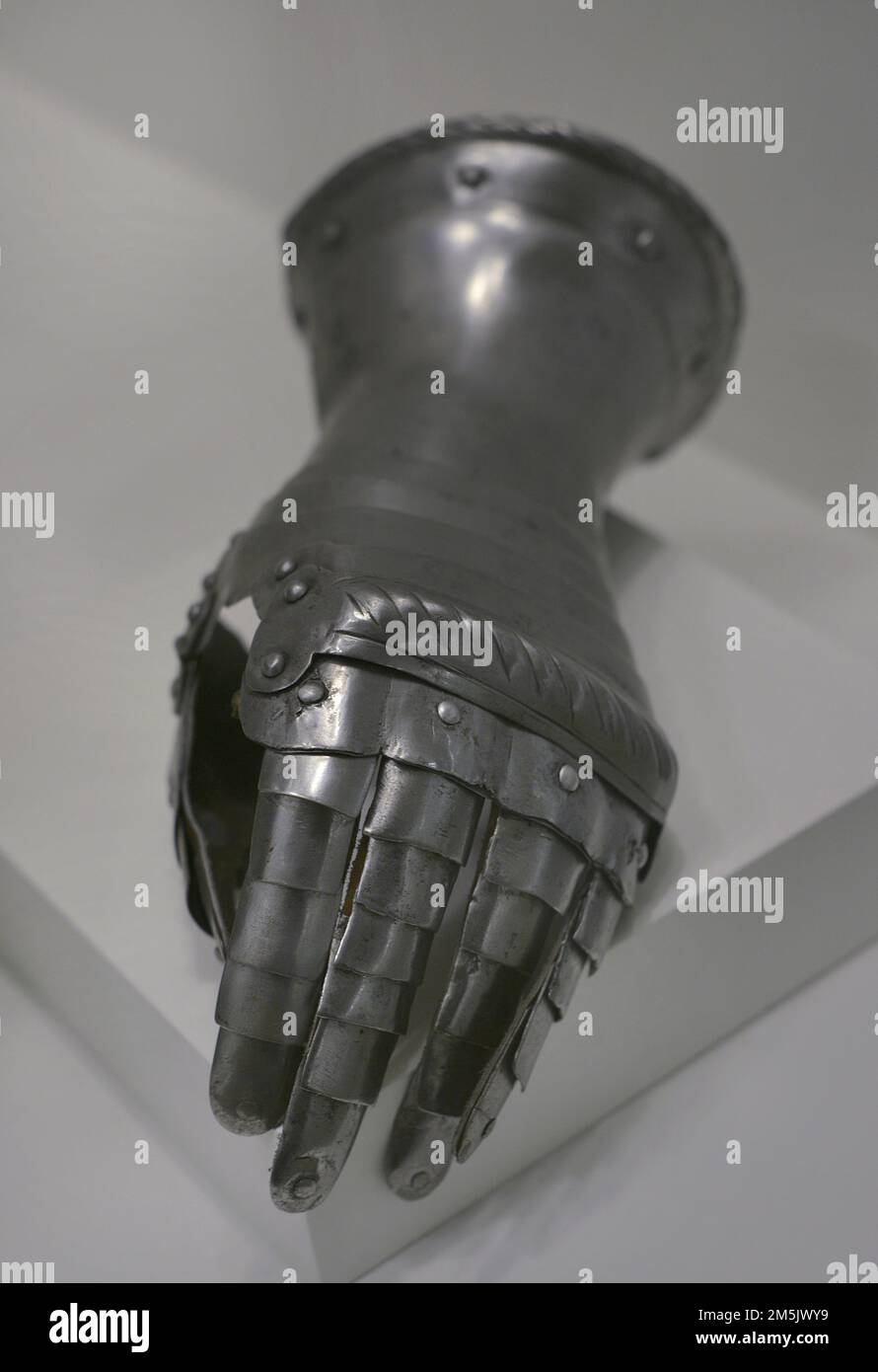 Armour. Gauntlet. Glove of metal plates which protected the hand ...