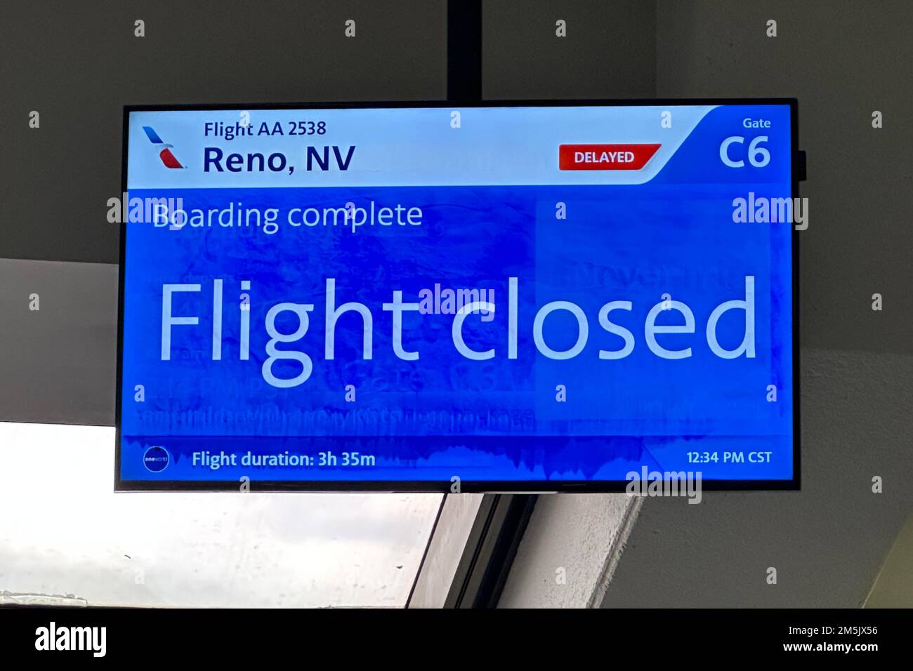 A flight closed message on fight monitor board for American Airlines ...