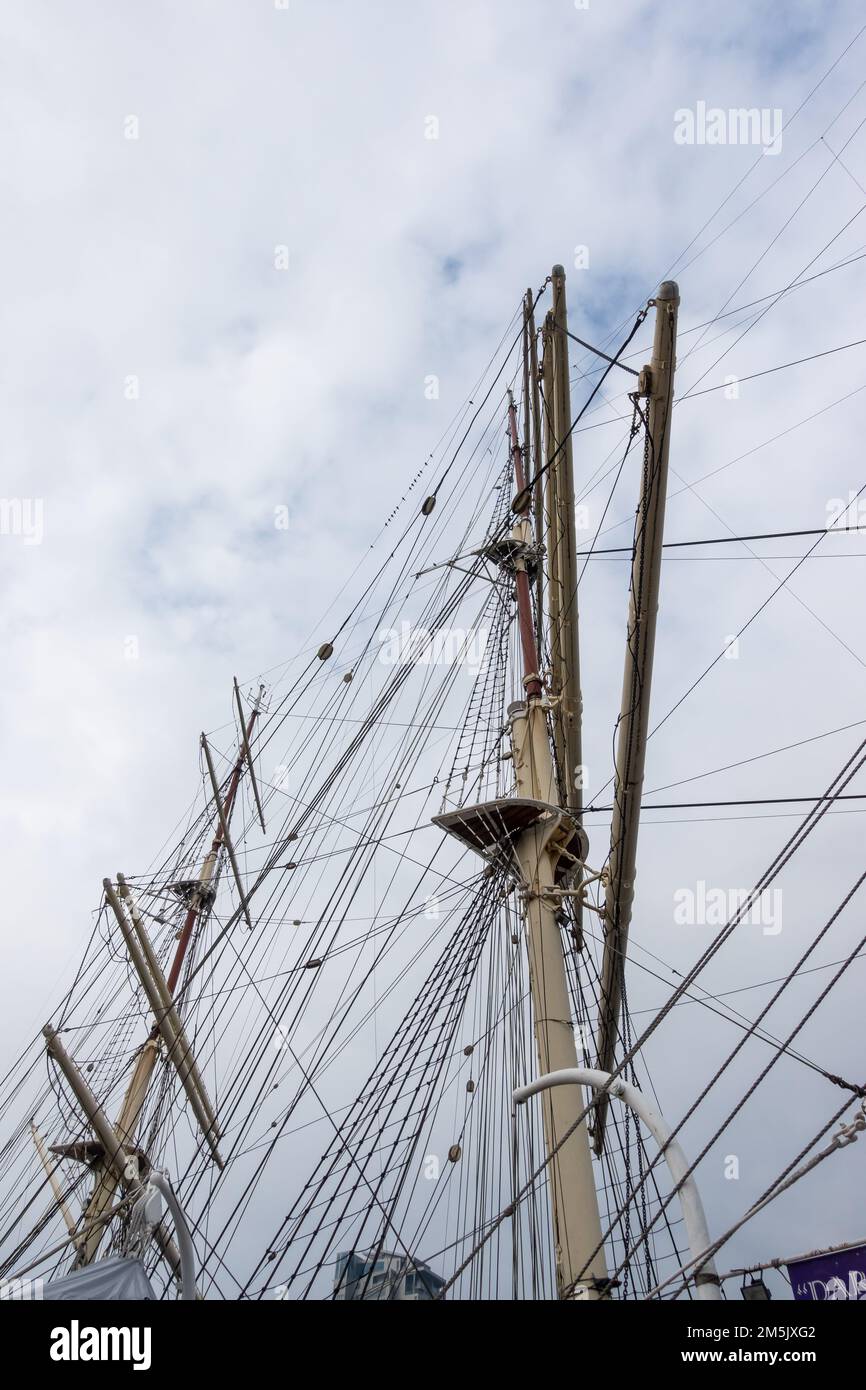 Rigging masts on a deep-sea sailing ship. The mast photographed against ...