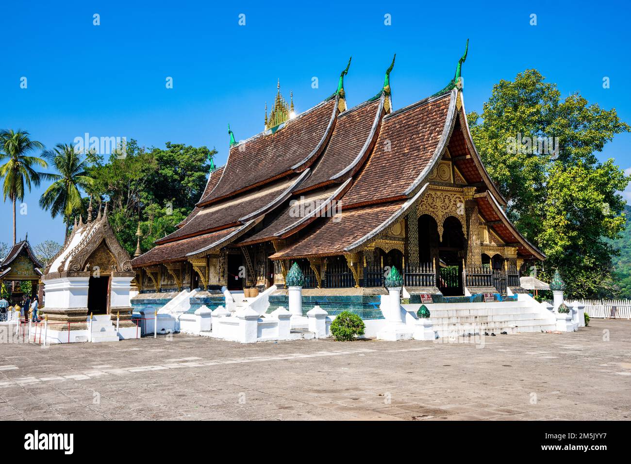 A scenic view of the beautiful architecture of Wat Xiengthong temple ...