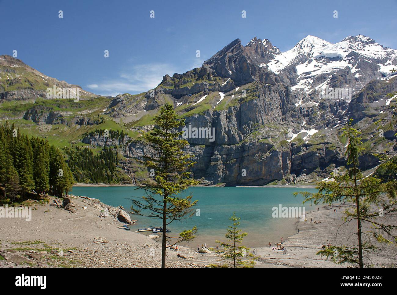 A scenic view of a beautiful landscape with a lake surrounded by ...