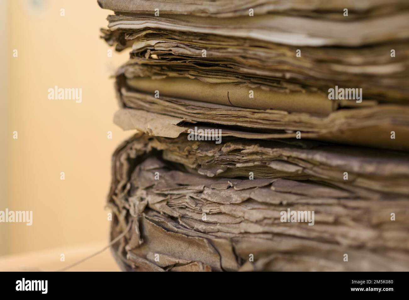 A closeup shot of very old paper stack Stock Photo - Alamy