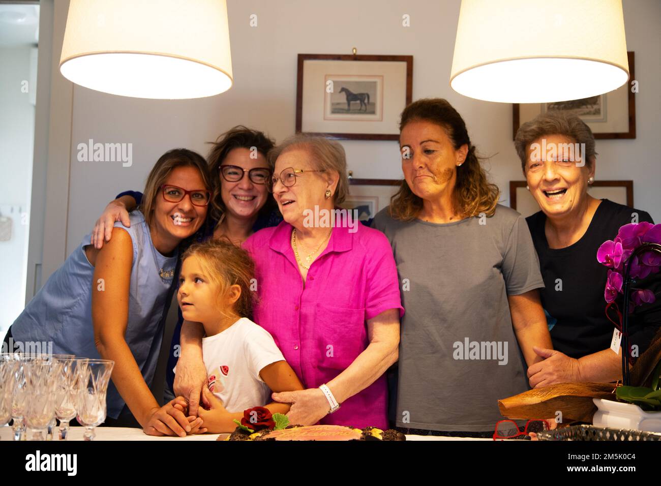 happy birthday party of a family of ordinary people Stock Photo - Alamy