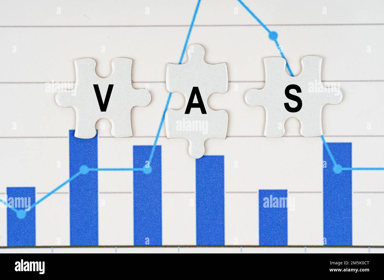 Business concept. On business reports - diagrams are puzzles with the ...