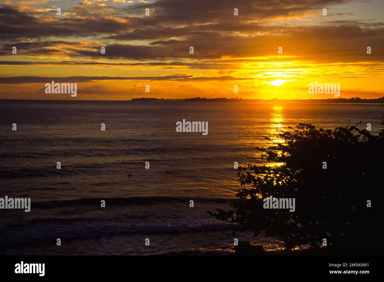 A beautiful view of the sunrise at the beach, Hilo, Hawaii Stock Photo ...