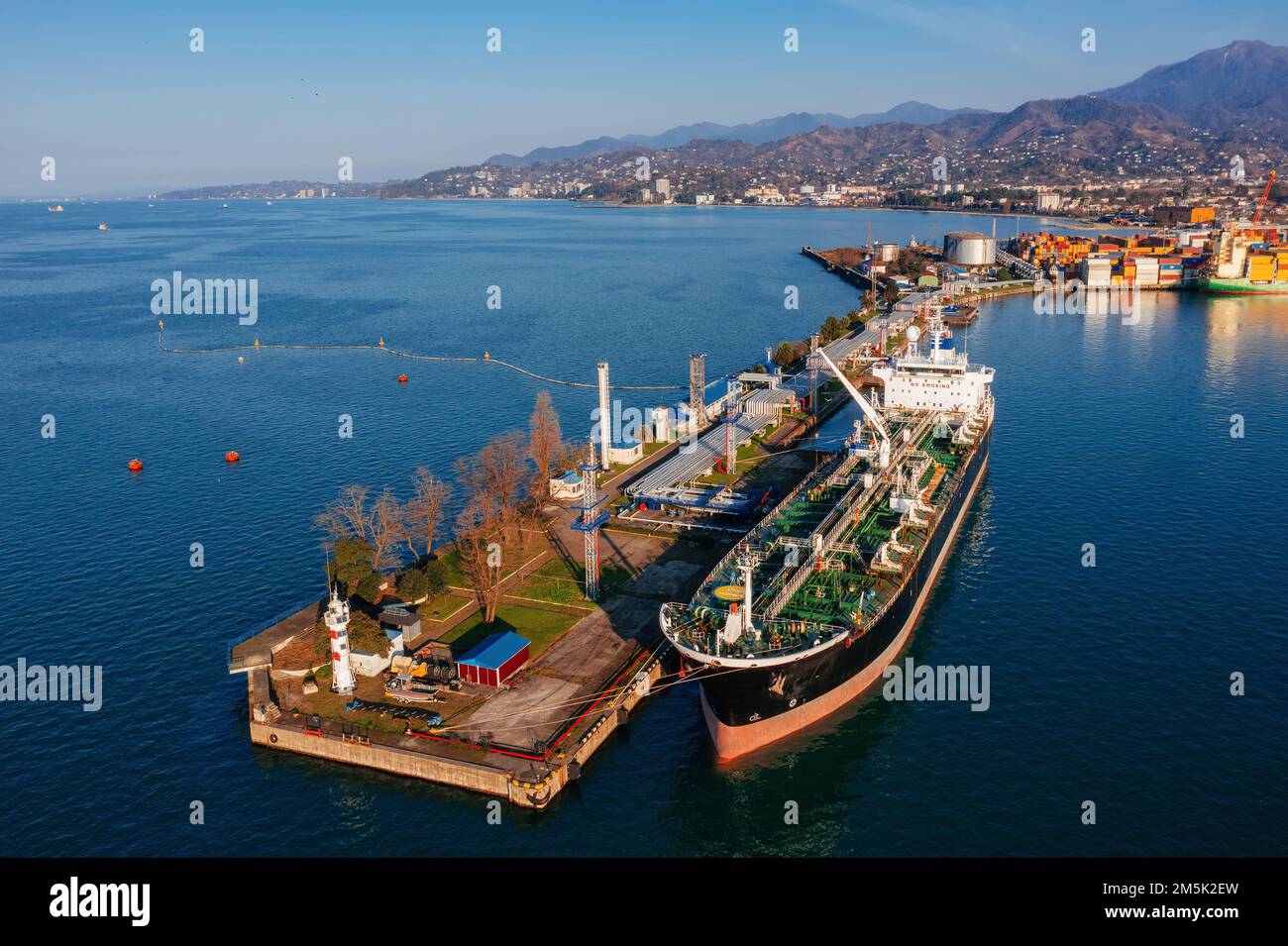 Ship tanker with LPG, oil or chemical production. Process of loading of ...