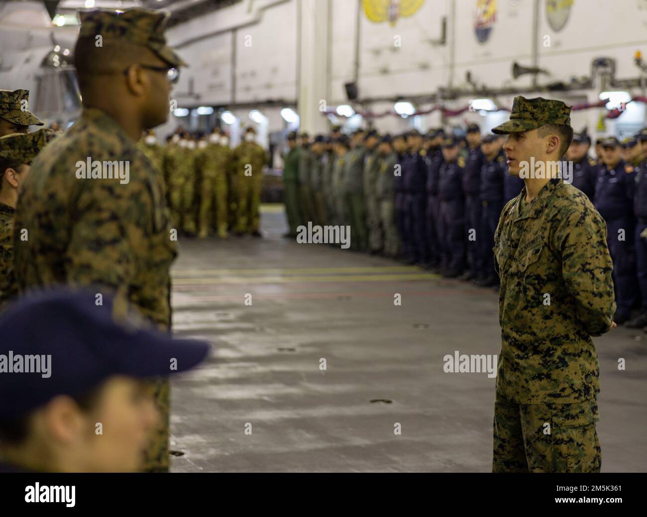 U.S. Marine Corps Cpl. Stefano Barone takes his place in front of the U ...