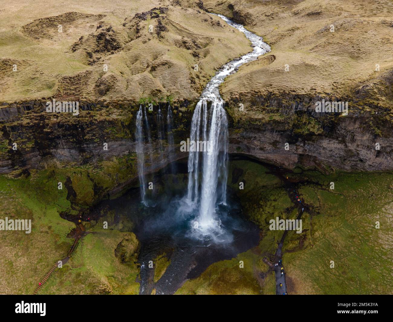 An aerial drone shot of the famous Seljalandsfoss waterfall in Iceland ...