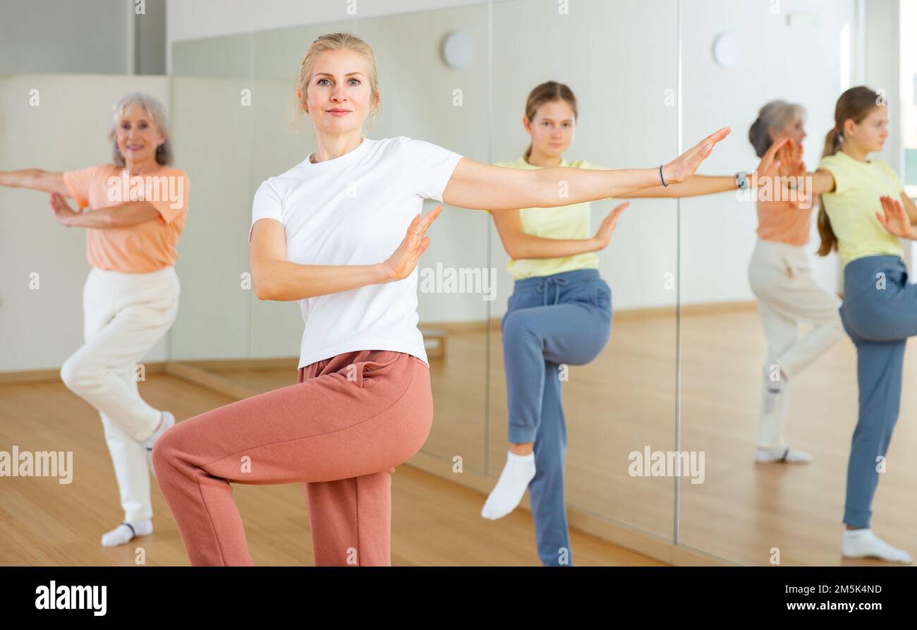 Women enjoying active dances in modern dance studio Stock Photo - Alamy