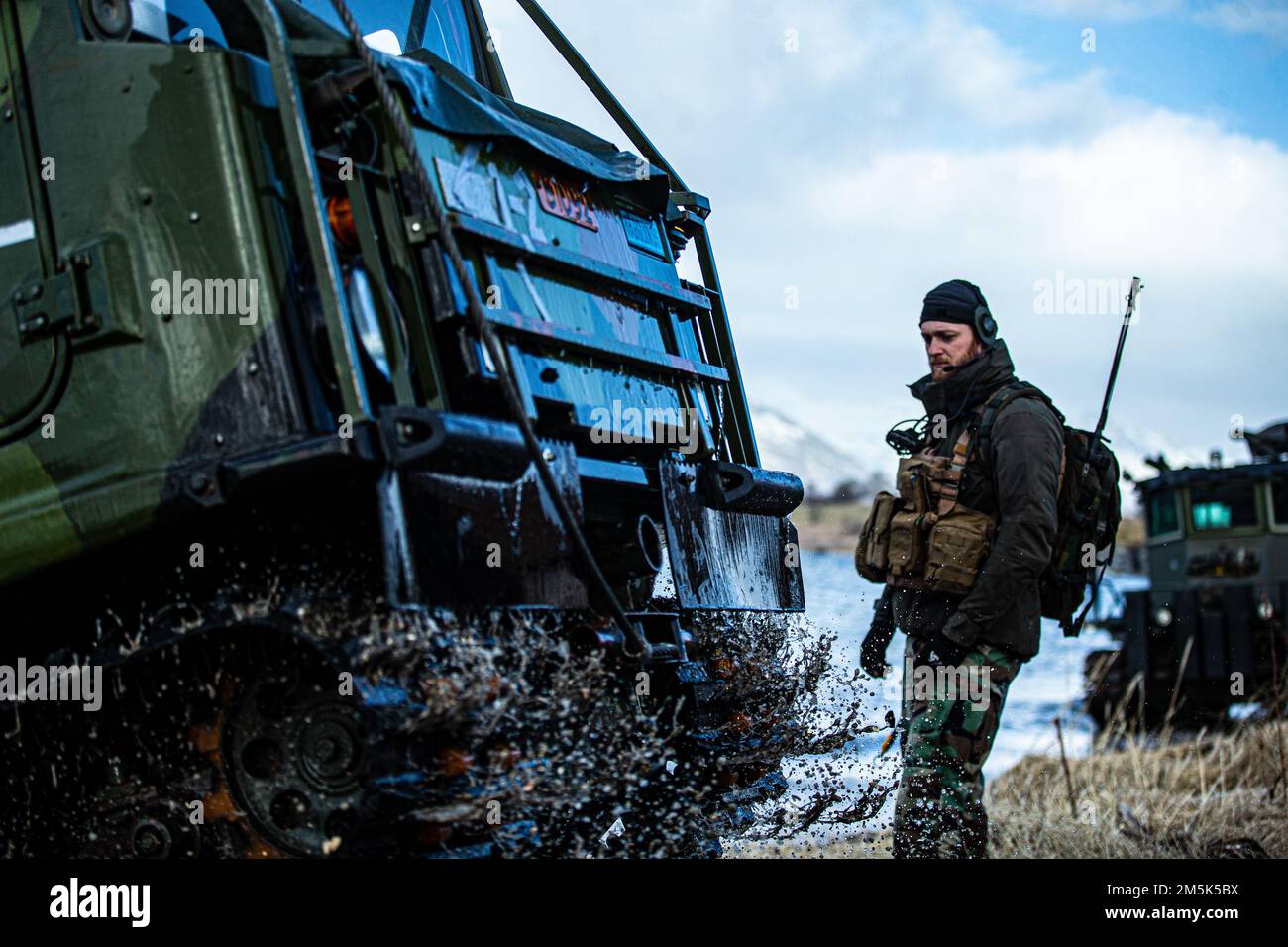 A Korps Marinier with the Royal Netherlands Marine Corps directs BV206 ...
