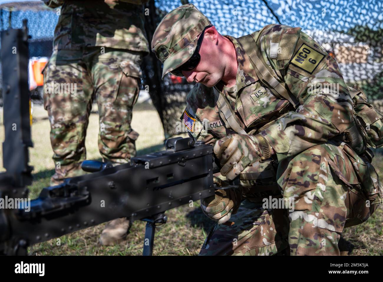 U.S. Army Sgt. 1st Class Corey Collins, a recruiter representing the ...