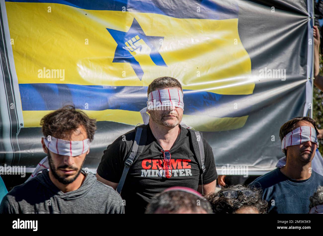 Israeli activists cover their eyes with a cloth the way its done to ...