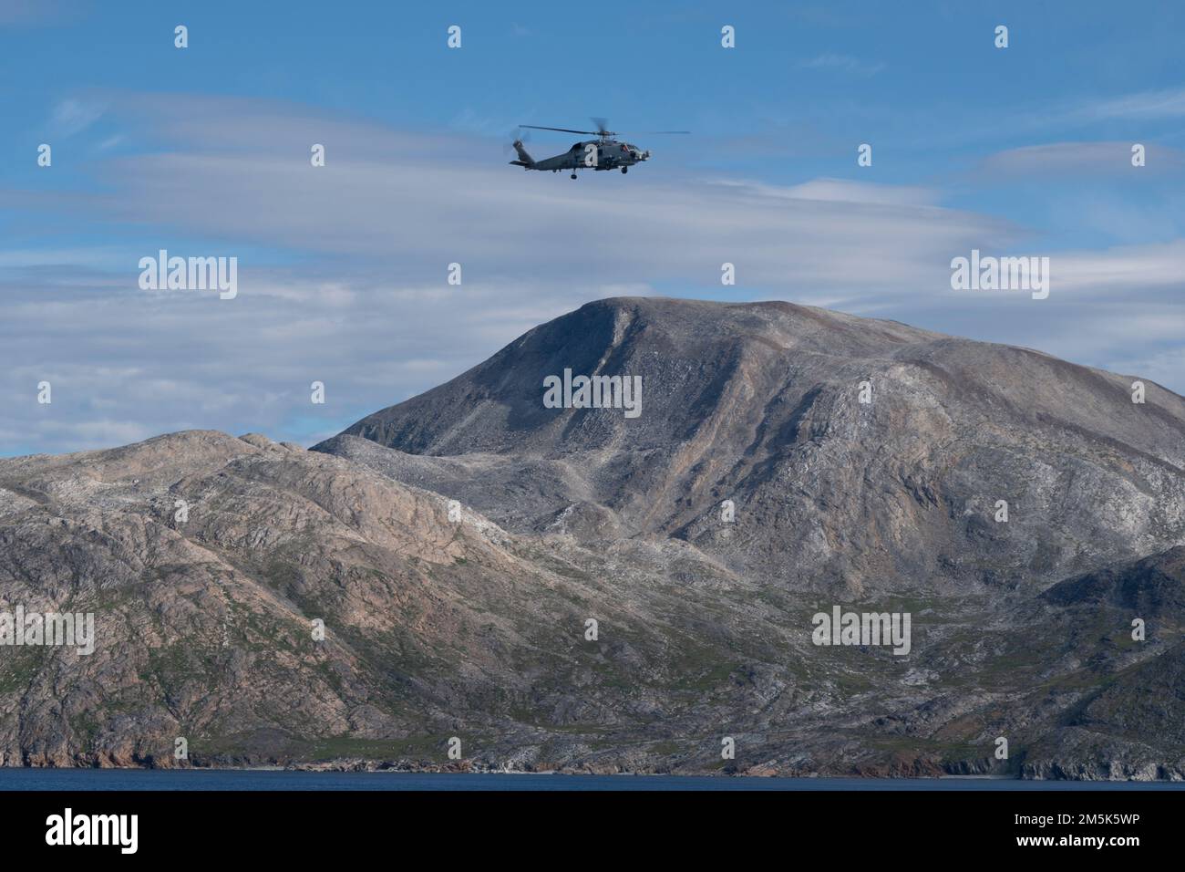 Danish MH-60R Seahawk helicopter flying from the Greenland Patrol Ship ...