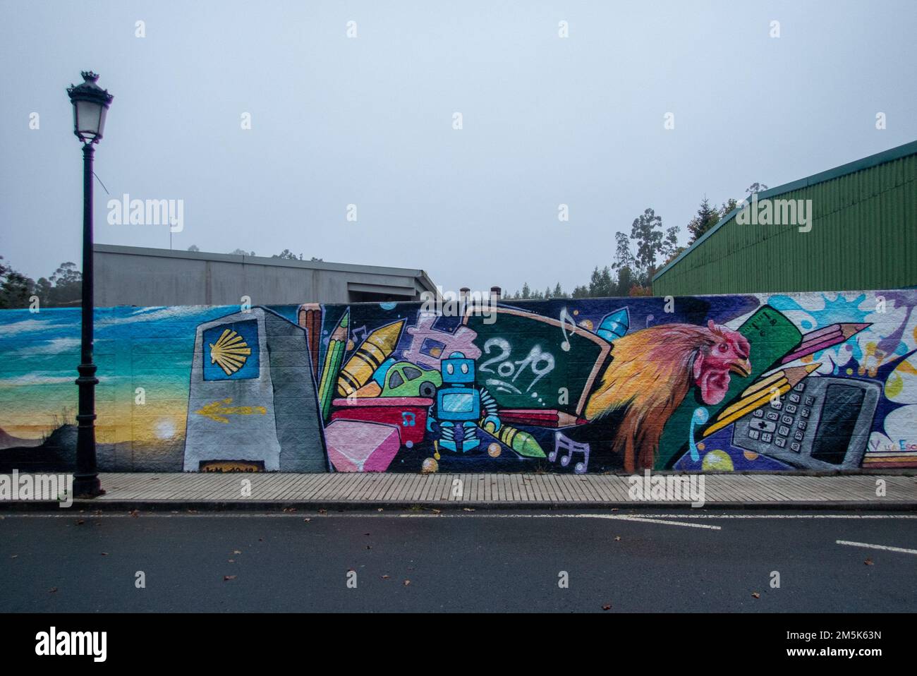 A colourful mural is greeting pilgrims passing though O Pedrouzo on the ...