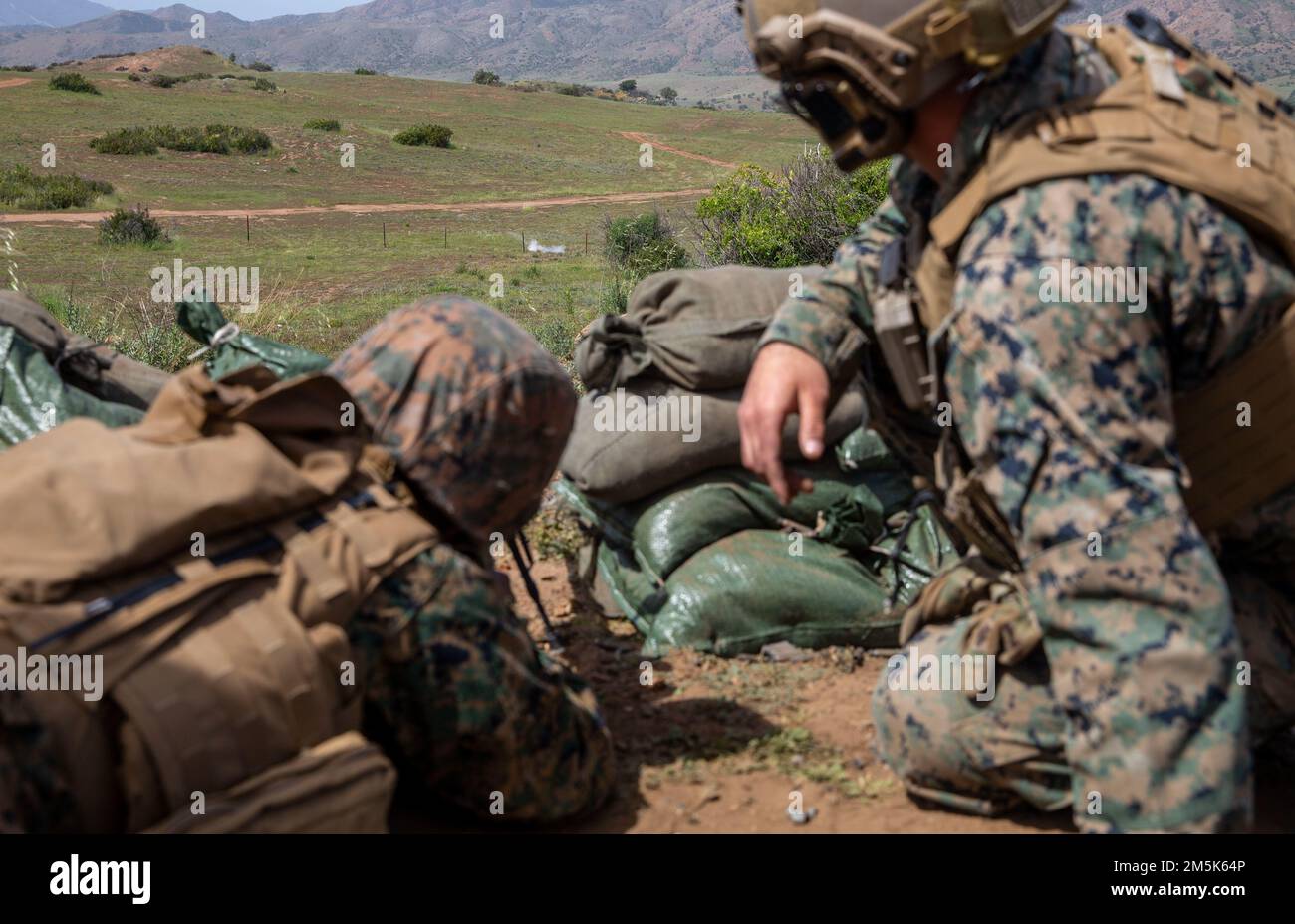U.S. Marine Sgt. Kyle Lamb, right, a team leader with Scout Sniper ...
