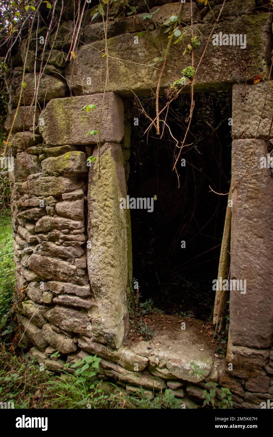 The ruins of a traditional Palloza house with round corners outside of ...