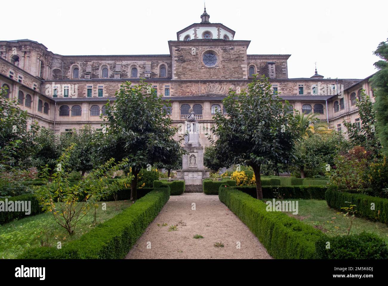 The great courtyard of Samos monastery in Galicia with its garden. Situated in the valley of the ...