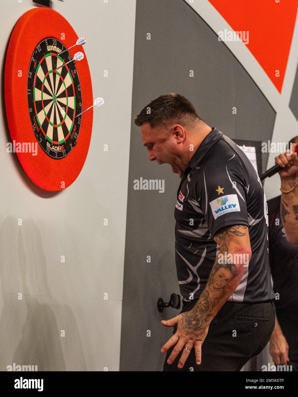 Gerwyn Price celebrates winning against Jose de Sousa in their match ...