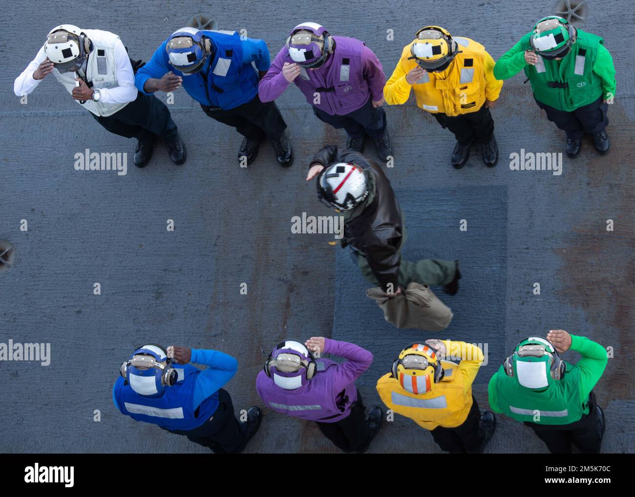 Vice Adm. Kenneth Whitesell, Commander, Naval Air Forces, salutes ...